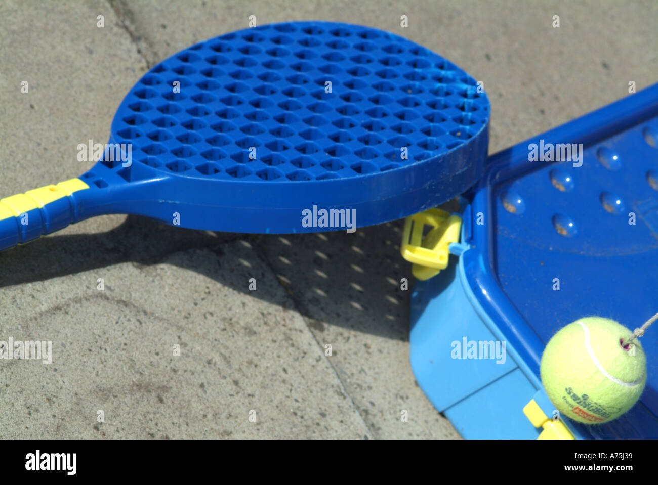 swing ball game tennis raquet Stock Photo - Alamy