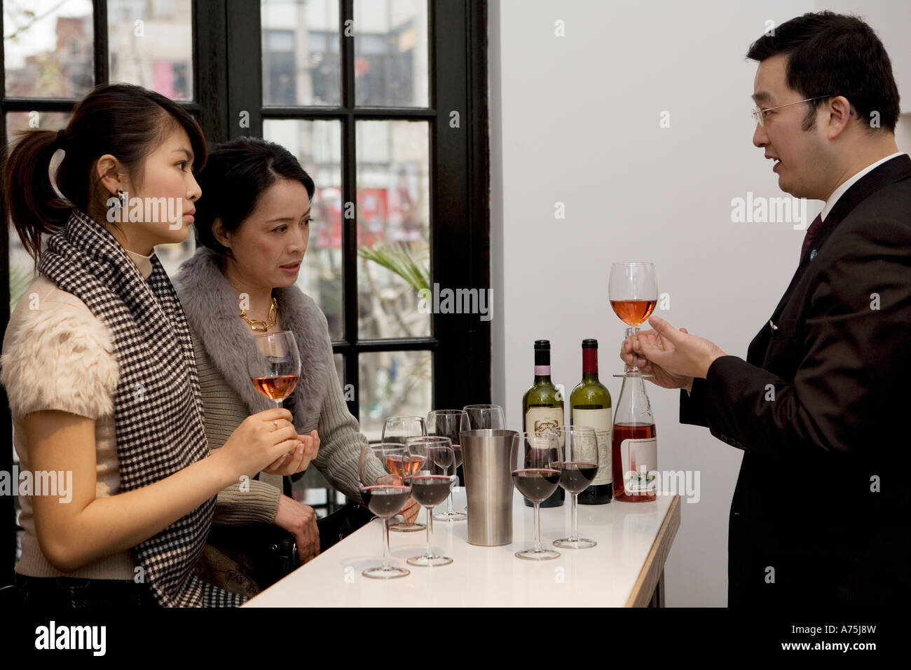 Women learning to taste wine Stock Photo - Alamy