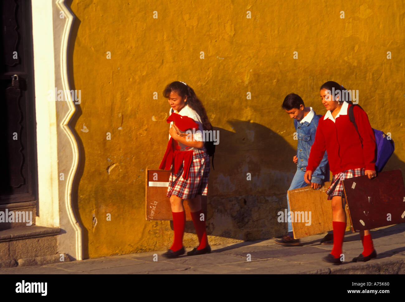 3 three Guatemalans teen girls and teen boy Guatemalan students wearing ...