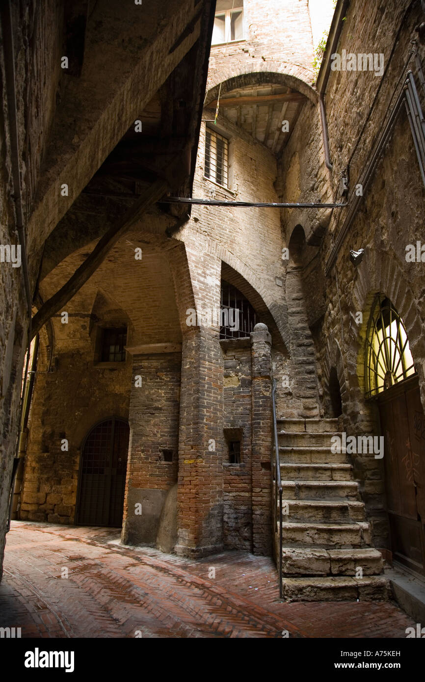 Perugia, Umbria, Italy; Small streets and alleys in the old city ...