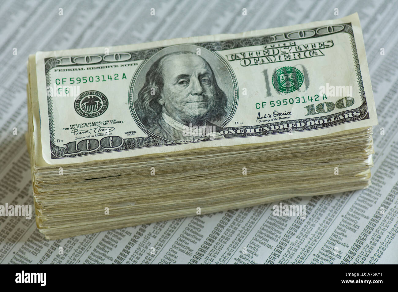 money dollars on financial pages Stock Photo - Alamy