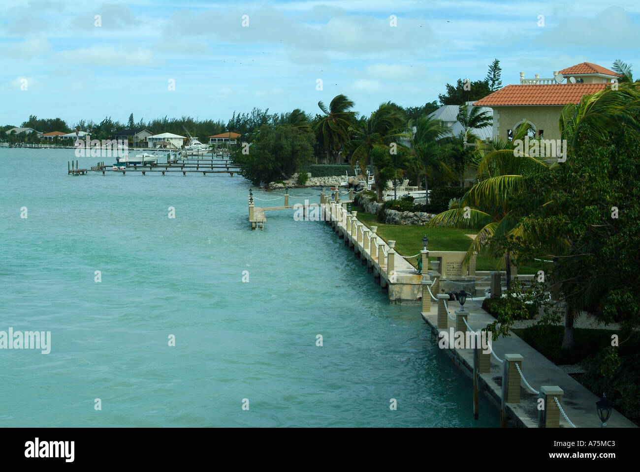 Typical houses along channel in Florida Stock Photo - Alamy