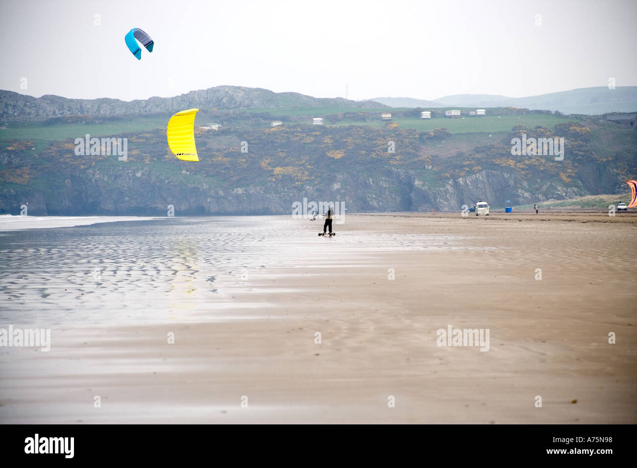 Kite skateboarding at Black Rock Sands North Wales UK Stock Photo - Alamy