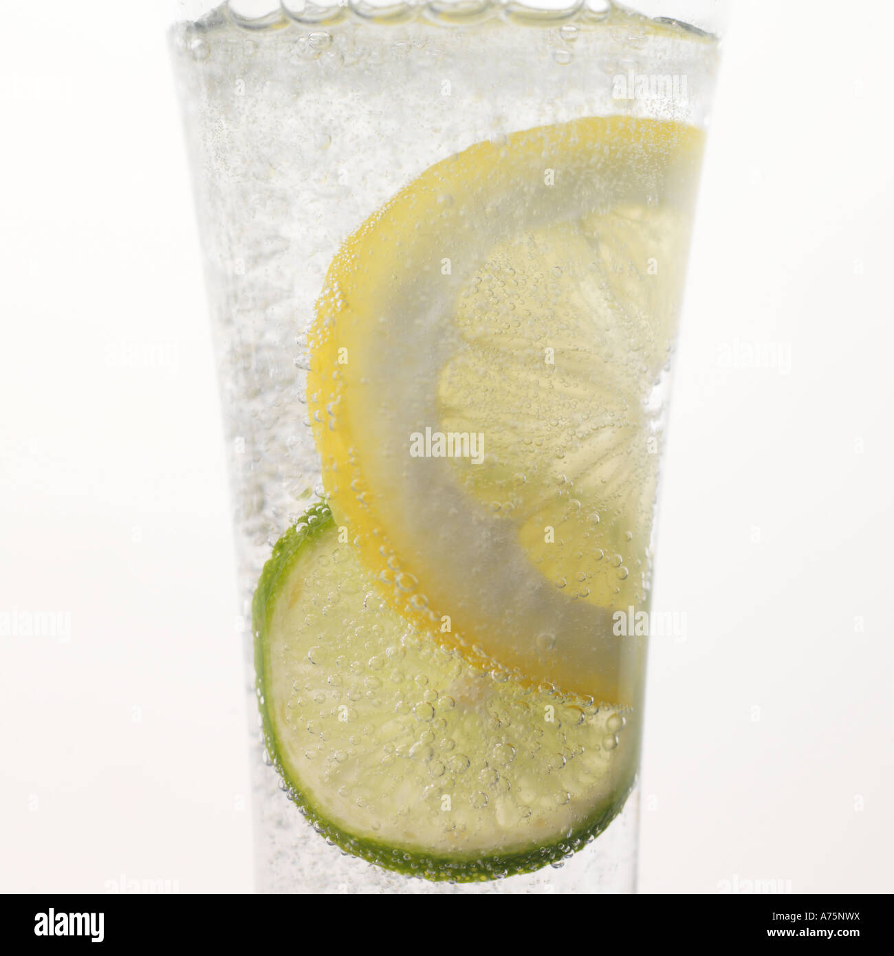 Glass sparkling water lime slices hi-res stock photography and images - Alamy