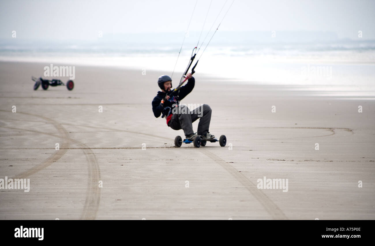 Kite skateboarding at Black Rock Sands North Wales UK Stock Photo - Alamy