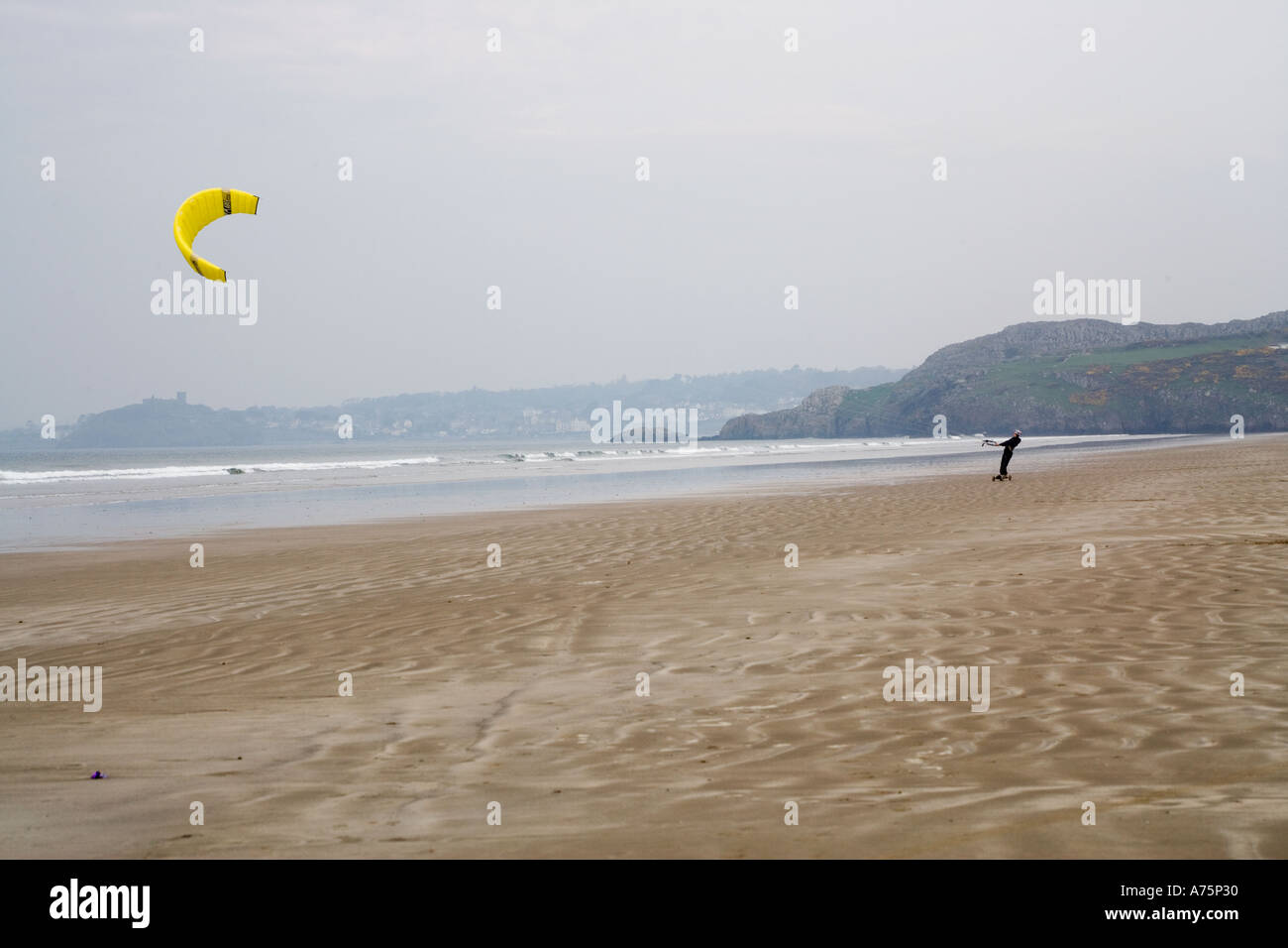 Kite skateboarding at Black Rock Sands North Wales UK Stock Photo - Alamy
