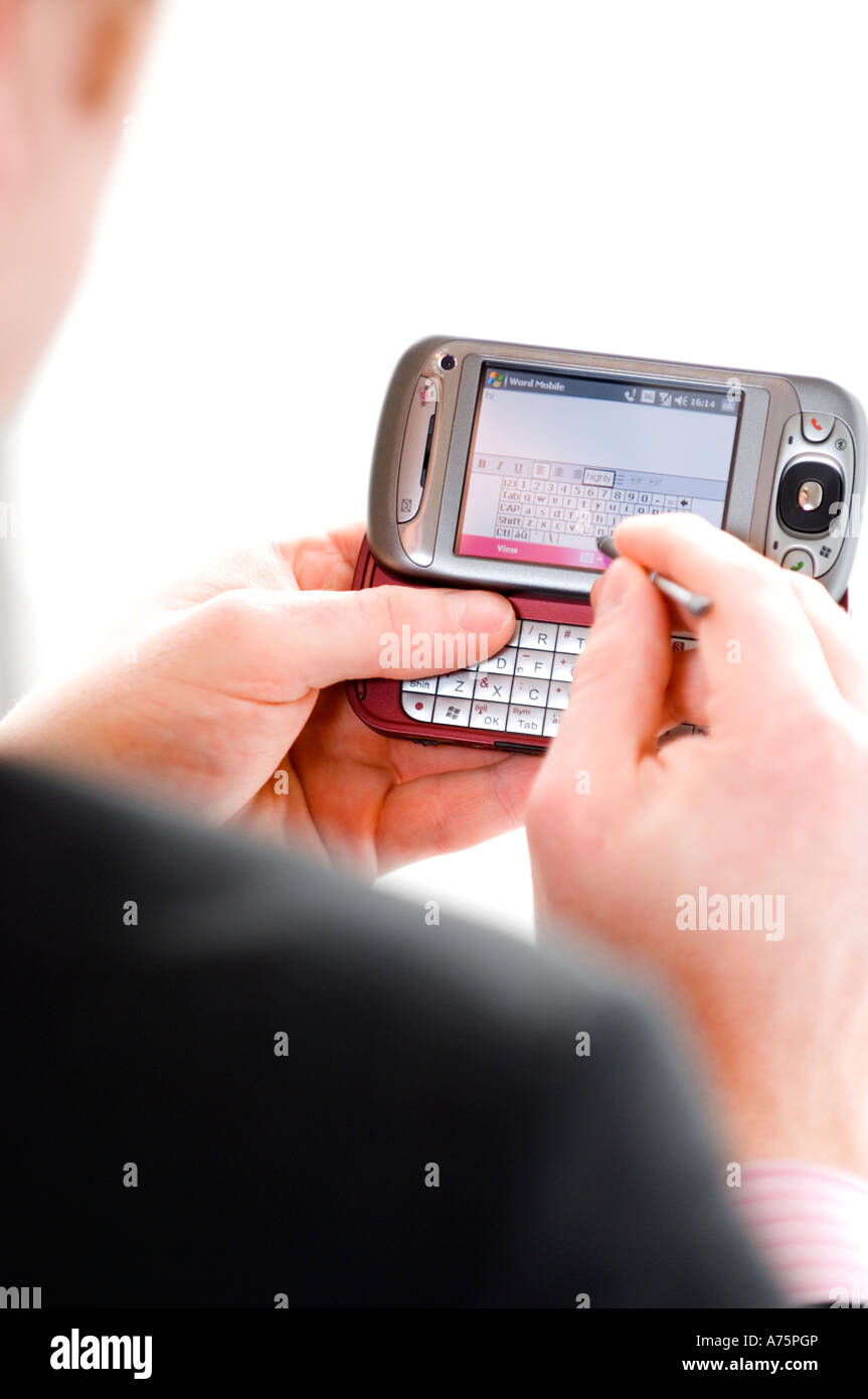 White male hands holding and operating a modern mobile cell phone with ...