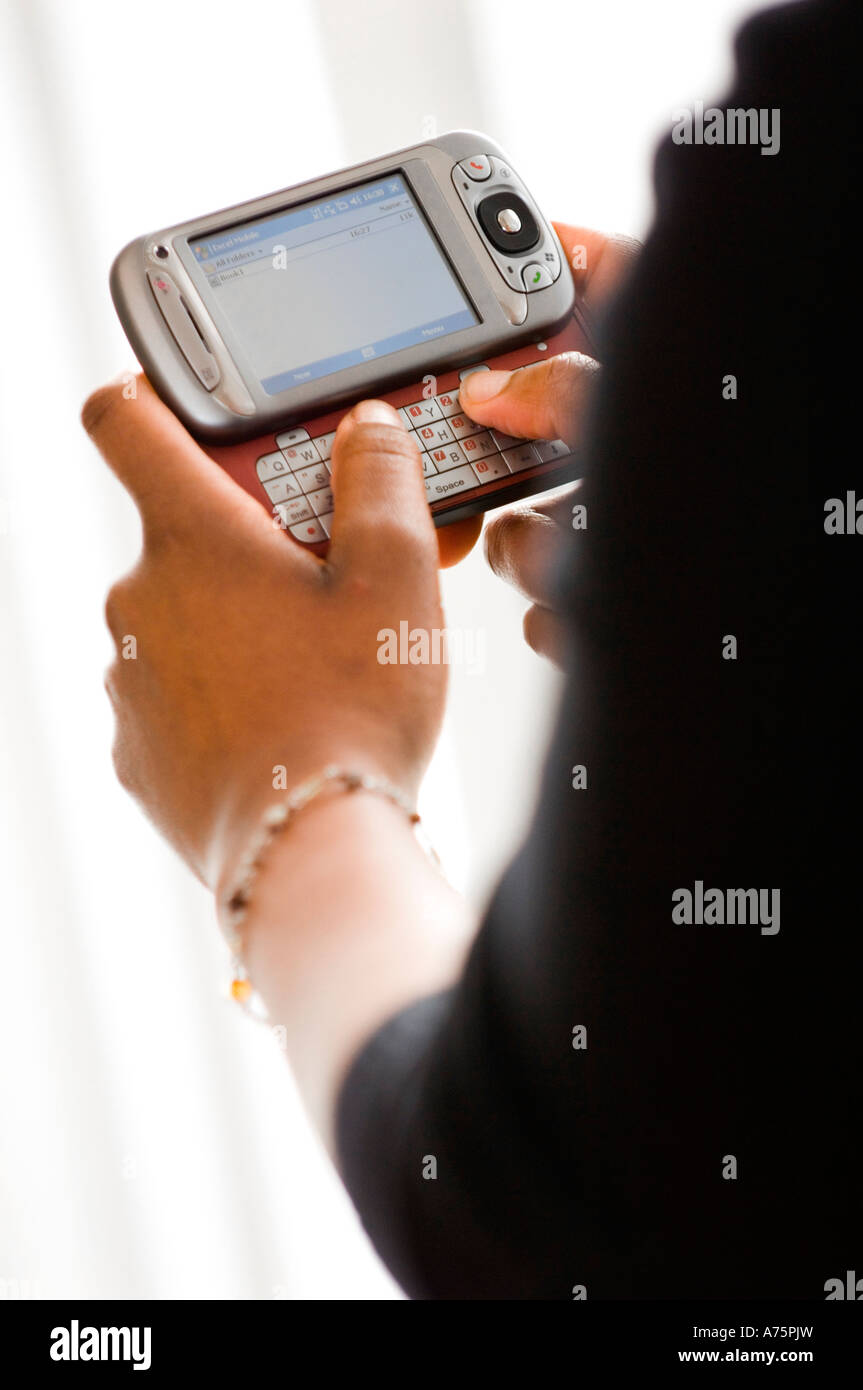 Womans hands holding cell phone hi-res stock photography and images - Alamy