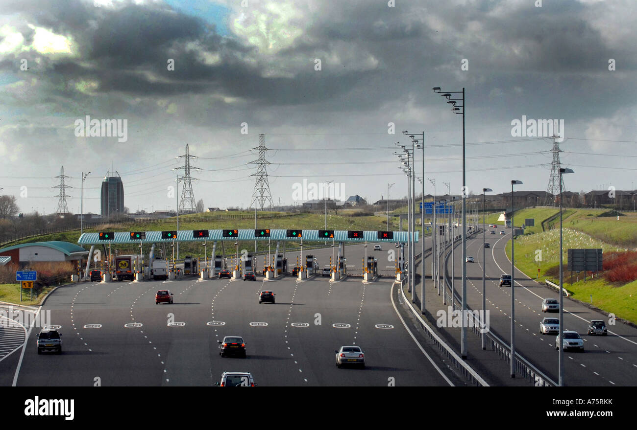 THE M6 TOLL ROAD PAYMENT BOOTHS AT THE TOLL PLAZA AT GREAT WYRLEY NEAR ...