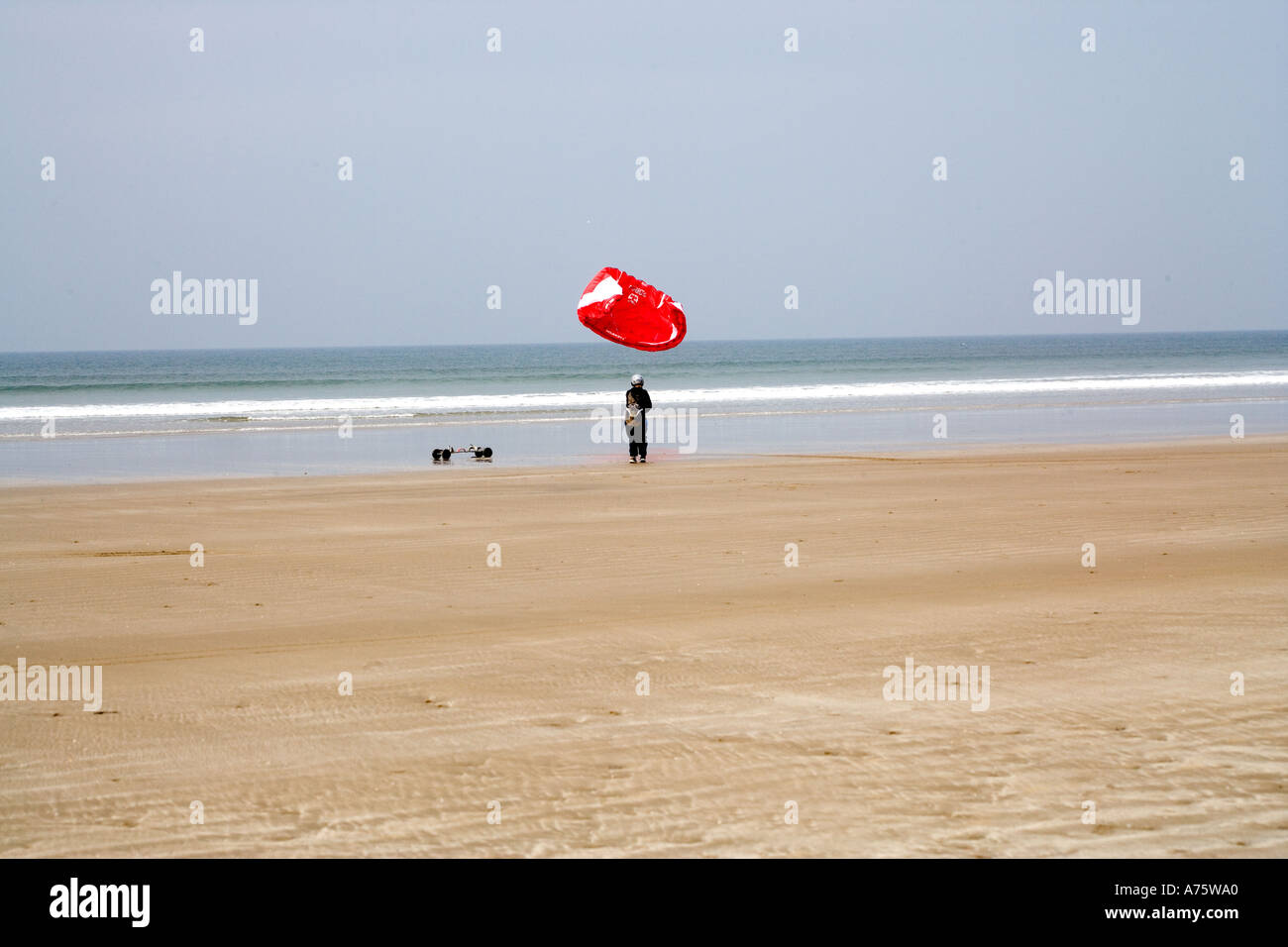 Kite skateboarding at Black Rock Sands North Wales United Kingdom Stock ...