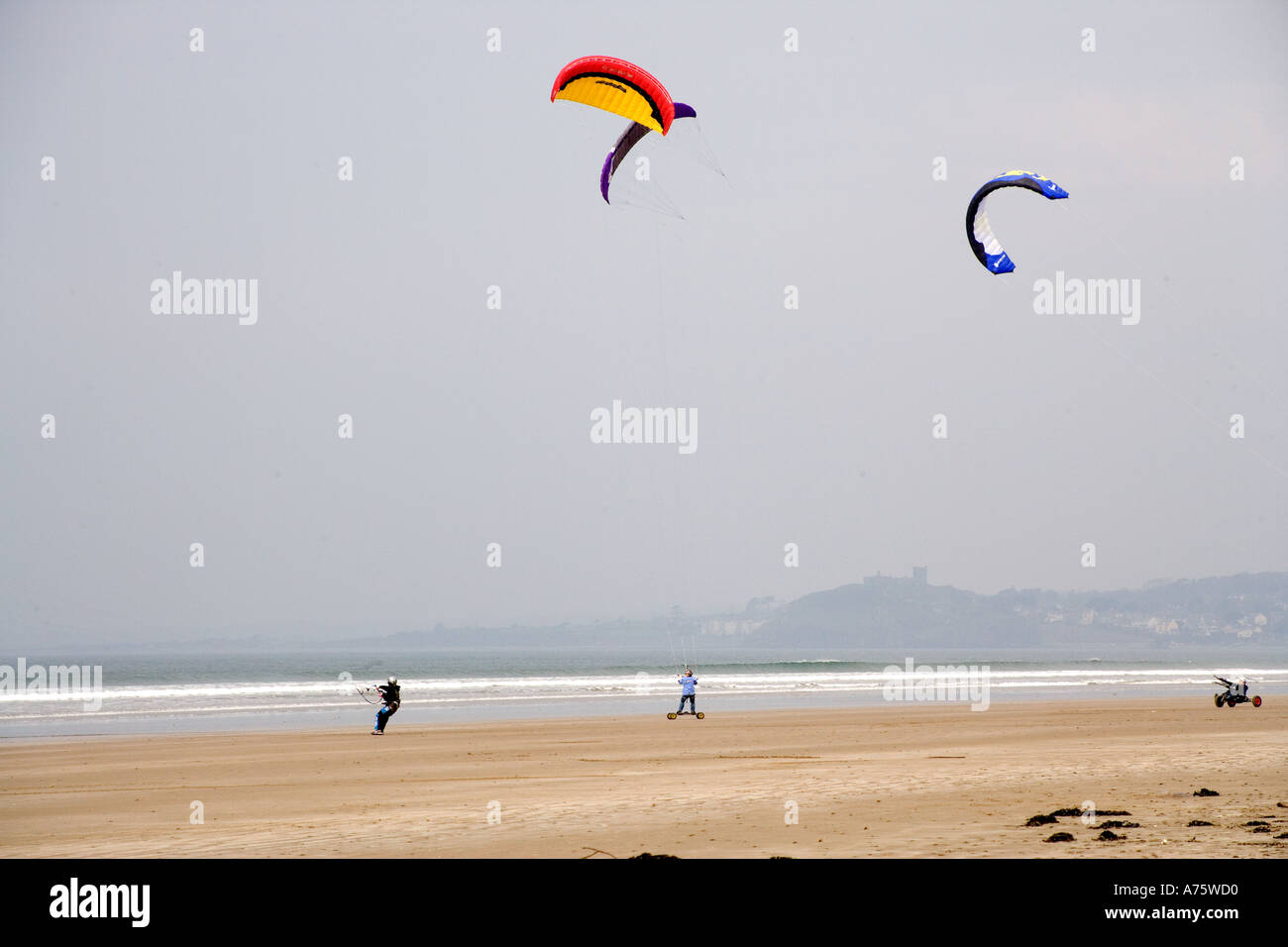 Kite skateboarding at Black Rock Sands North Wales United Kingdom Stock ...