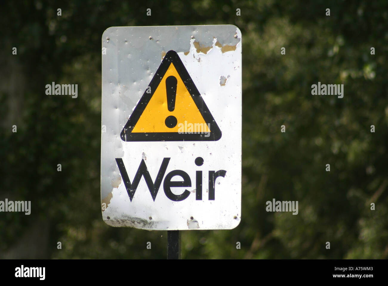 A sign for a Weir on an English River Stock Photo - Alamy