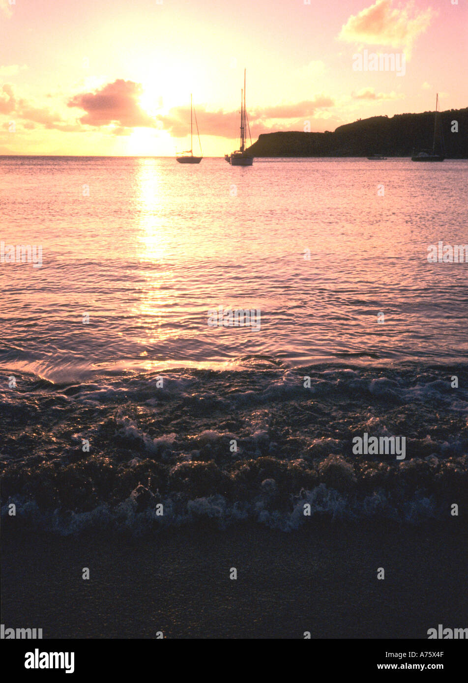 sunset over galleon beach antigua west indies caribbean Stock Photo - Alamy