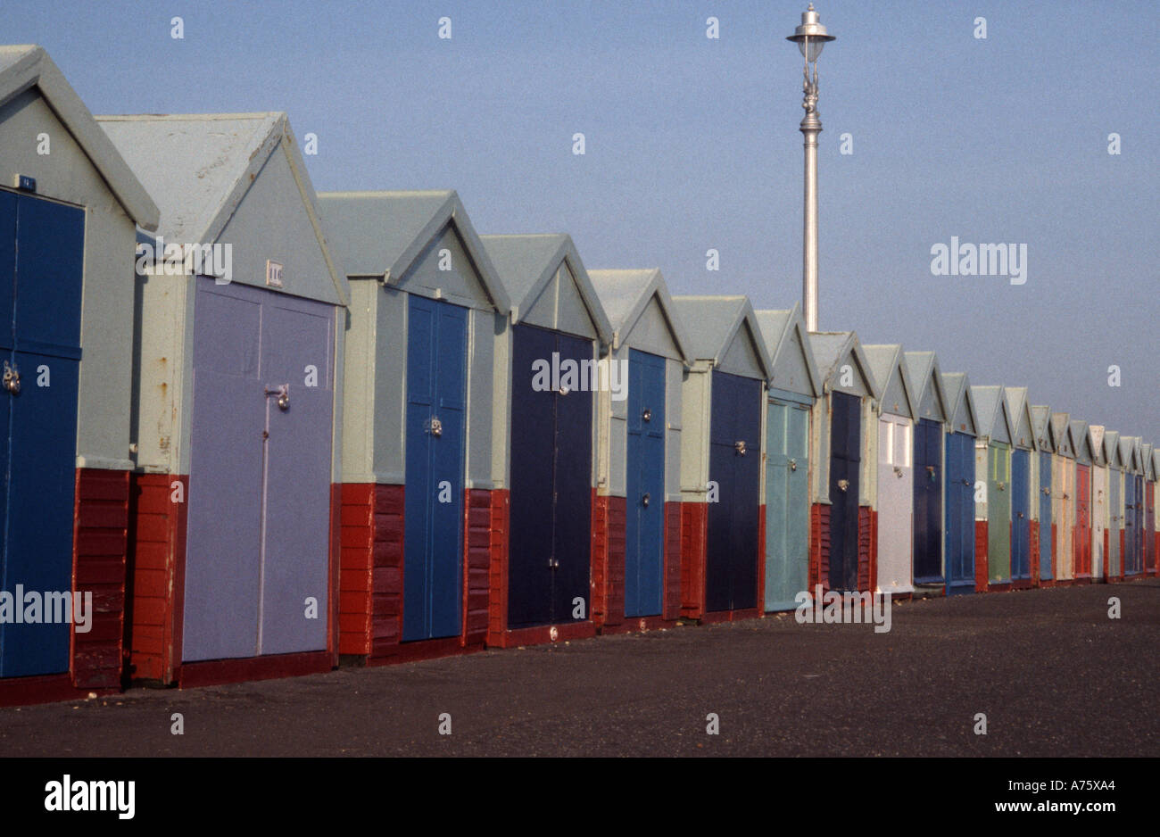 Row of brightly coloured beach huts Brighton England UK Stock Photo - Alamy