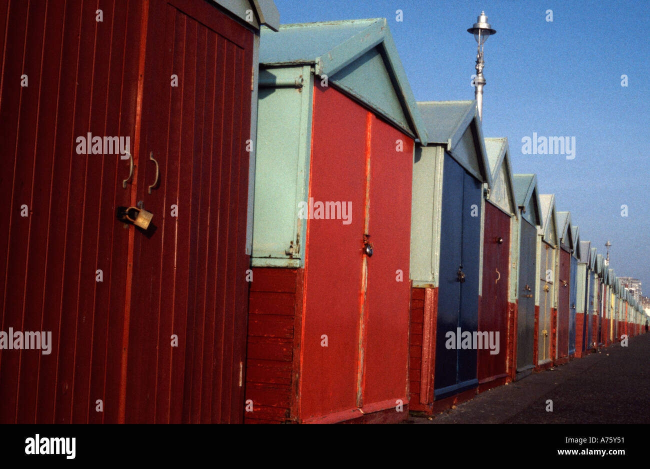 Row of brightly coloured beach huts Brighton UK Stock Photo - Alamy
