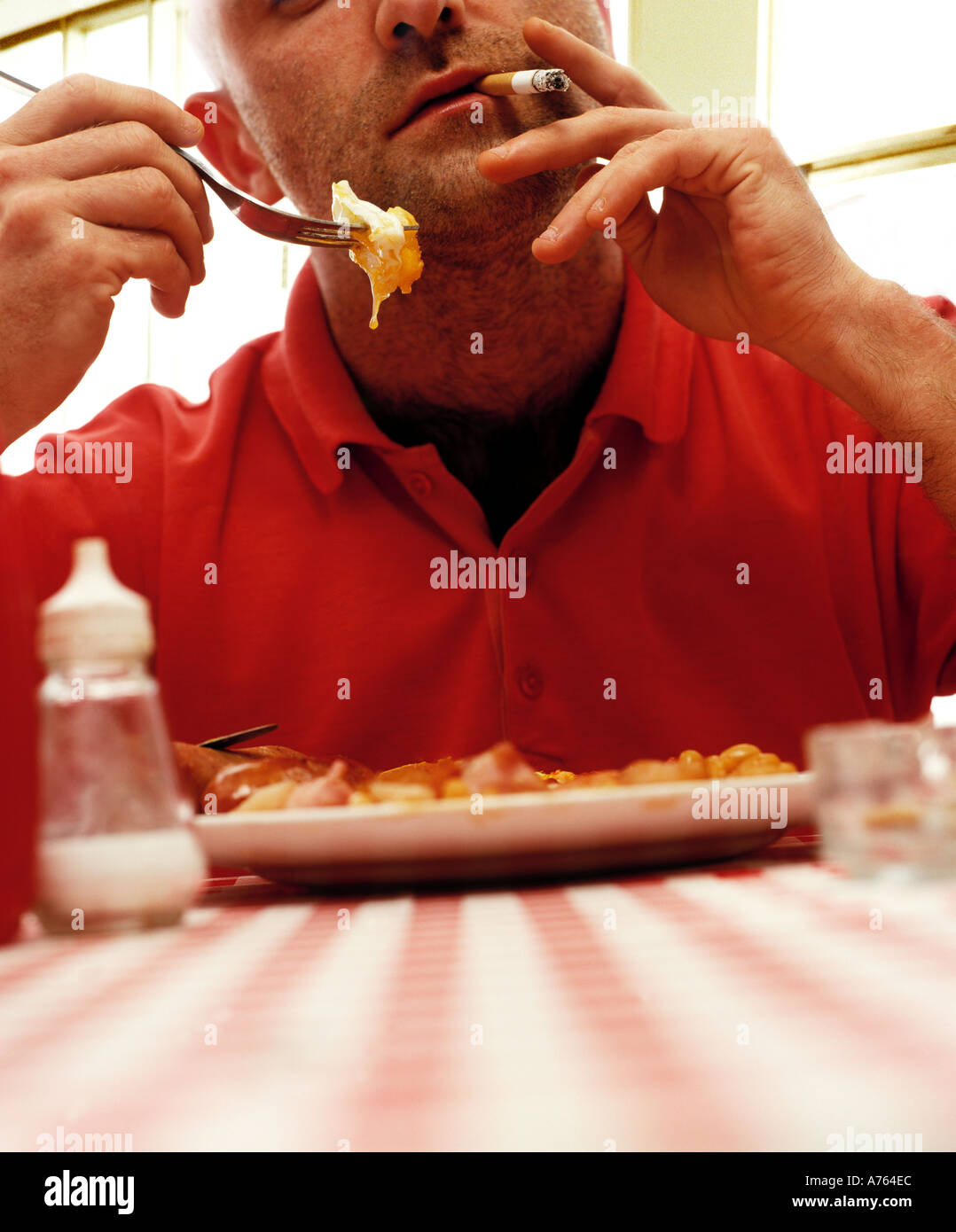 Fat man smoking hi-res stock photography and images - Alamy