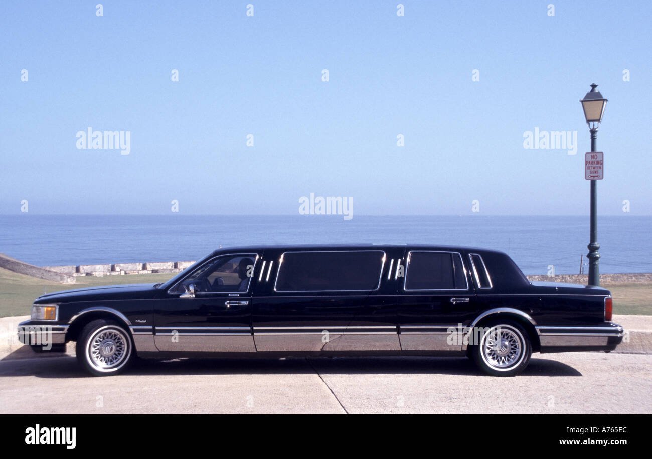 Street scene in San Juan Puerto Rico side view black stretch limousine ...