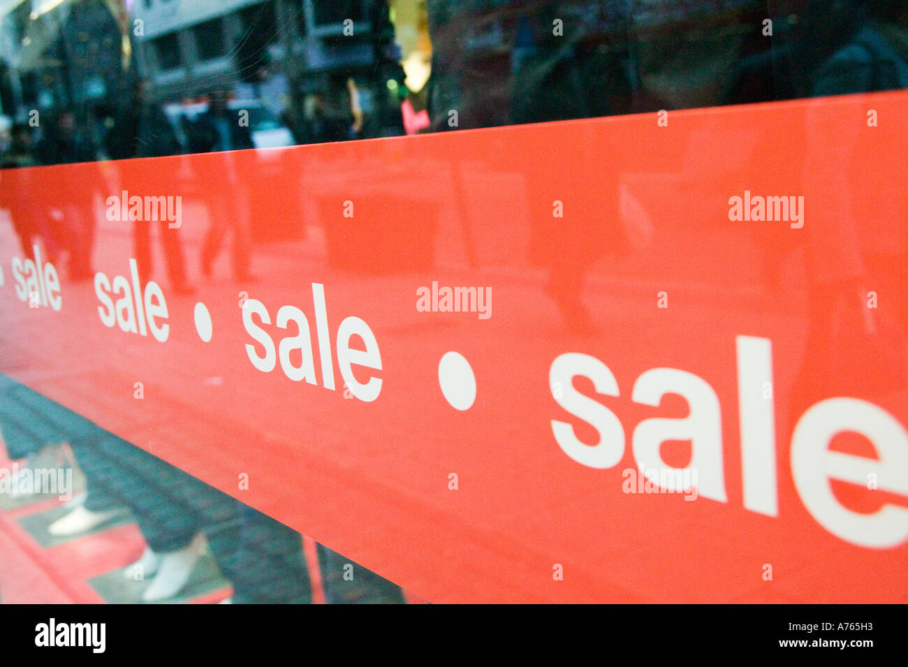 Shopwindow with sale sign Stock Photo - Alamy