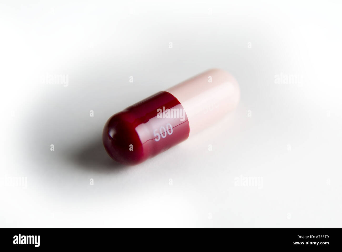 Red and pink capsule Stock Photo - Alamy