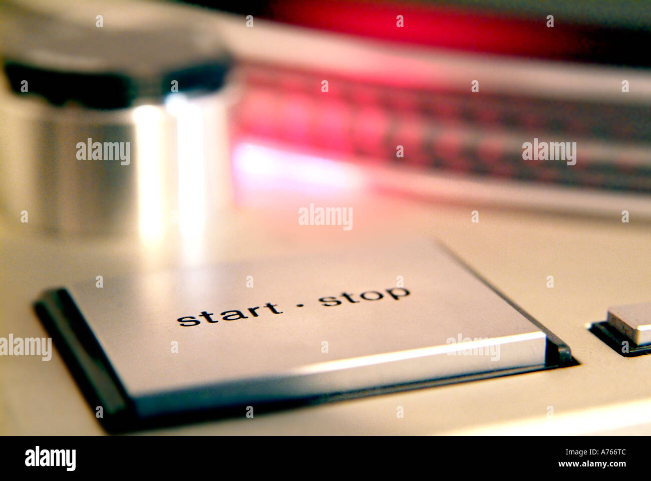 Record player Start - Stop button Stock Photo - Alamy