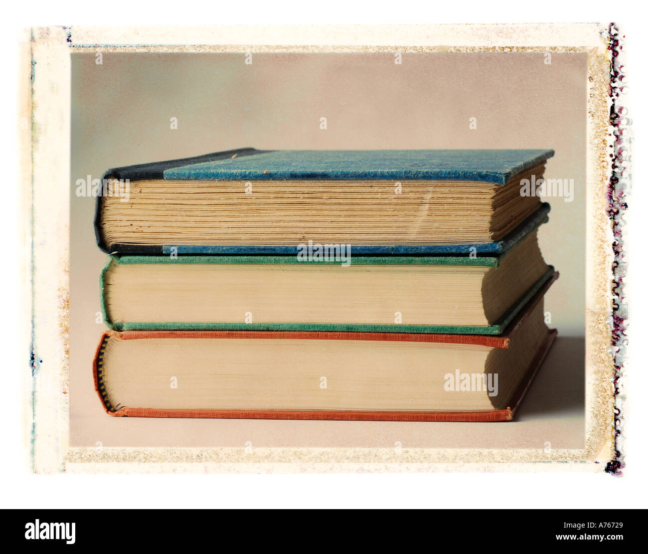 stack of three books Stock Photo - Alamy