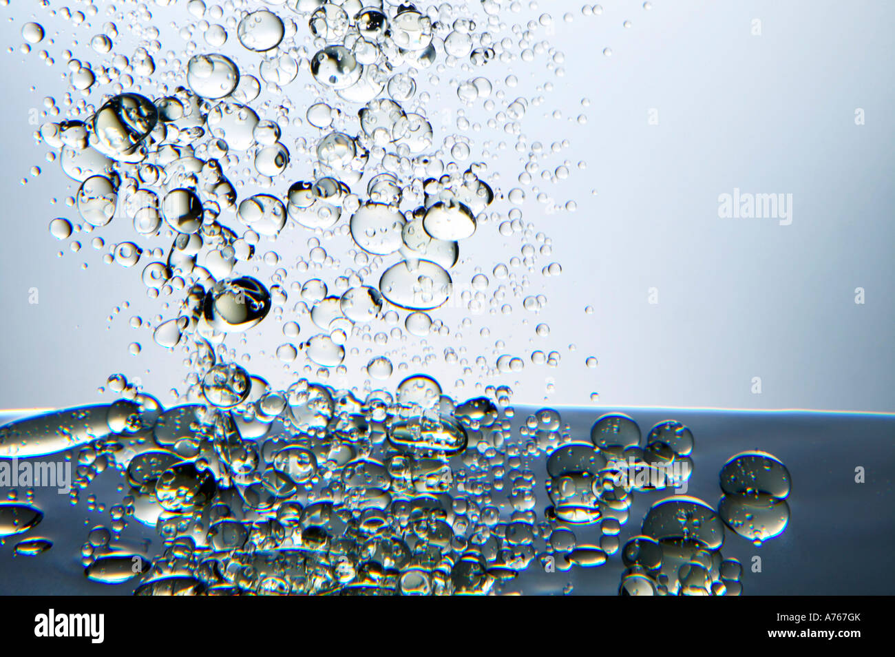 Oil drops in water, close-up Stock Photo - Alamy