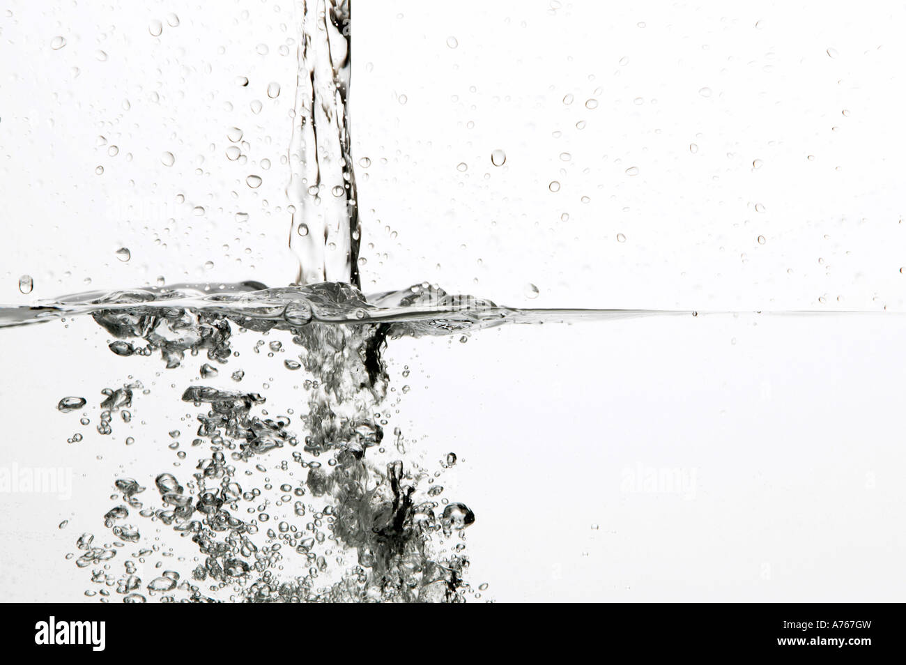 Pouring water, close-up Stock Photo - Alamy