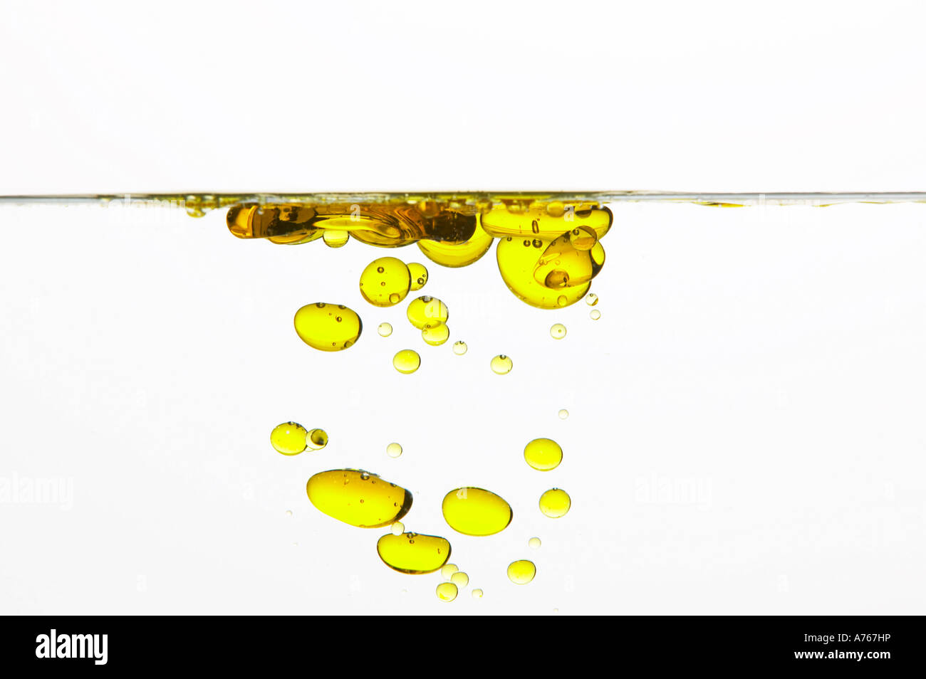 Oil drops in water, close-up Stock Photo - Alamy