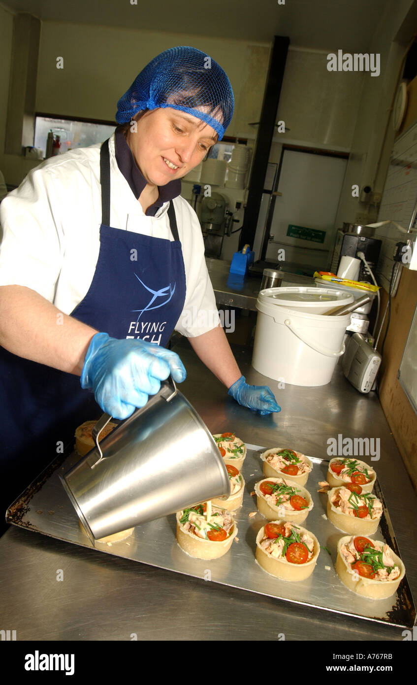 Preparing to cook fish cakes at the Flying Fish Feast industrial ...
