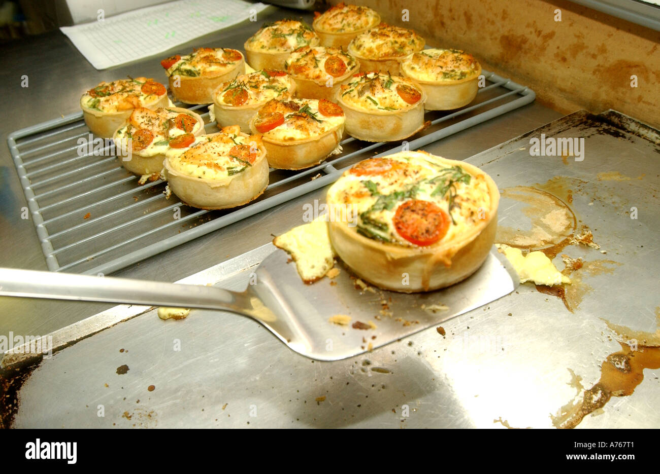 Preparing to cook fish cakes at the Flying Fish Feast industrial ...