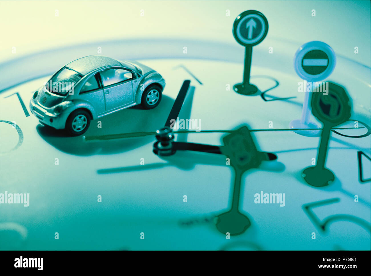 Miniature Traffic Signs and Car on Clock Stock Photo - Alamy