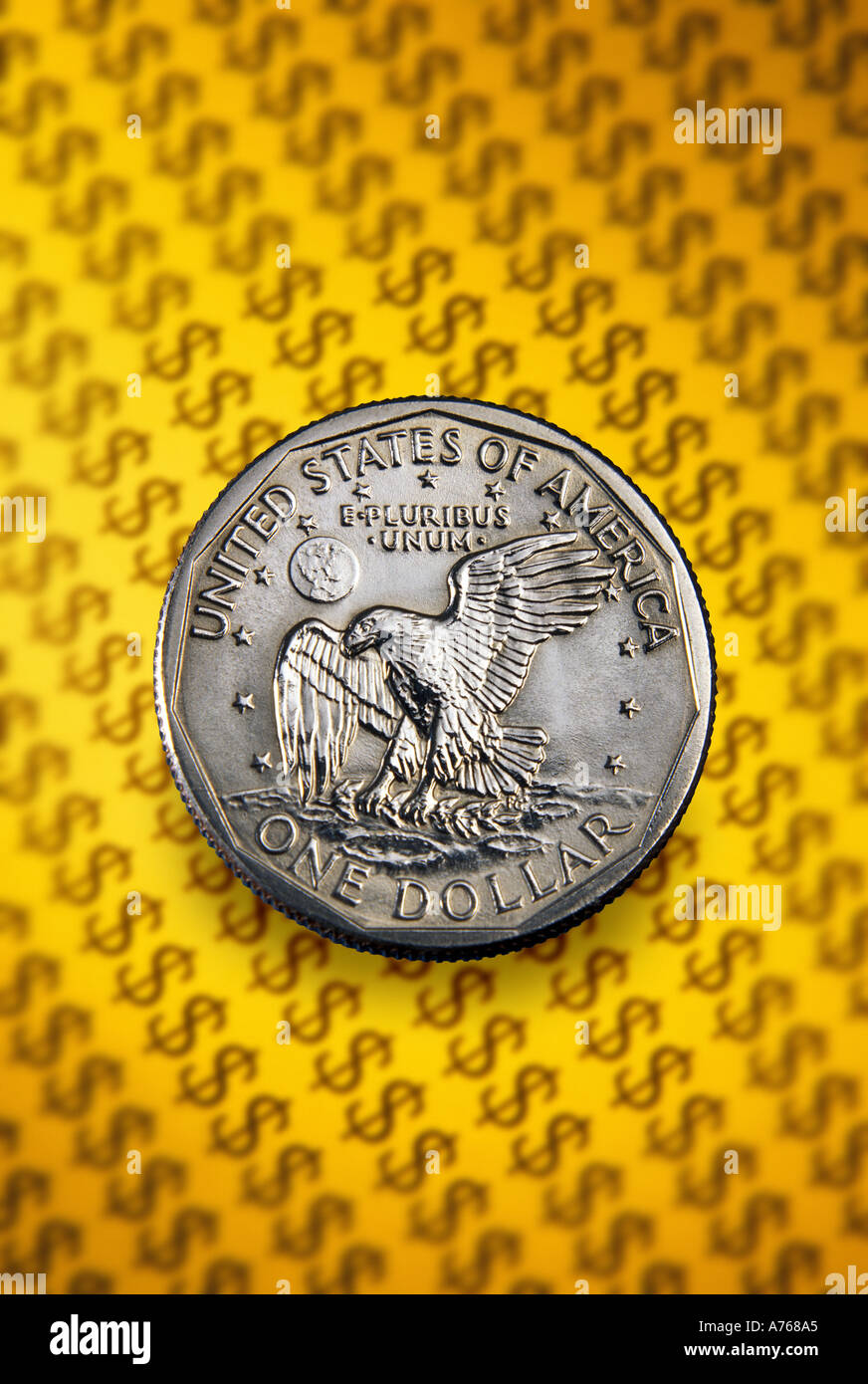 US Dollar coin with dollar sign symbol background Stock Photo - Alamy