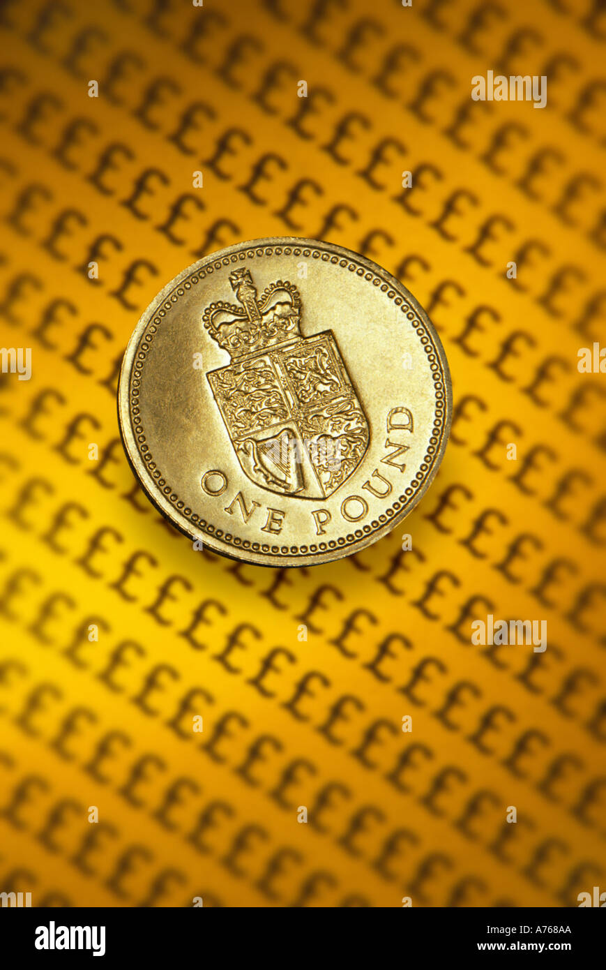 UK Pound coin with pound sign symbol background Stock Photo - Alamy