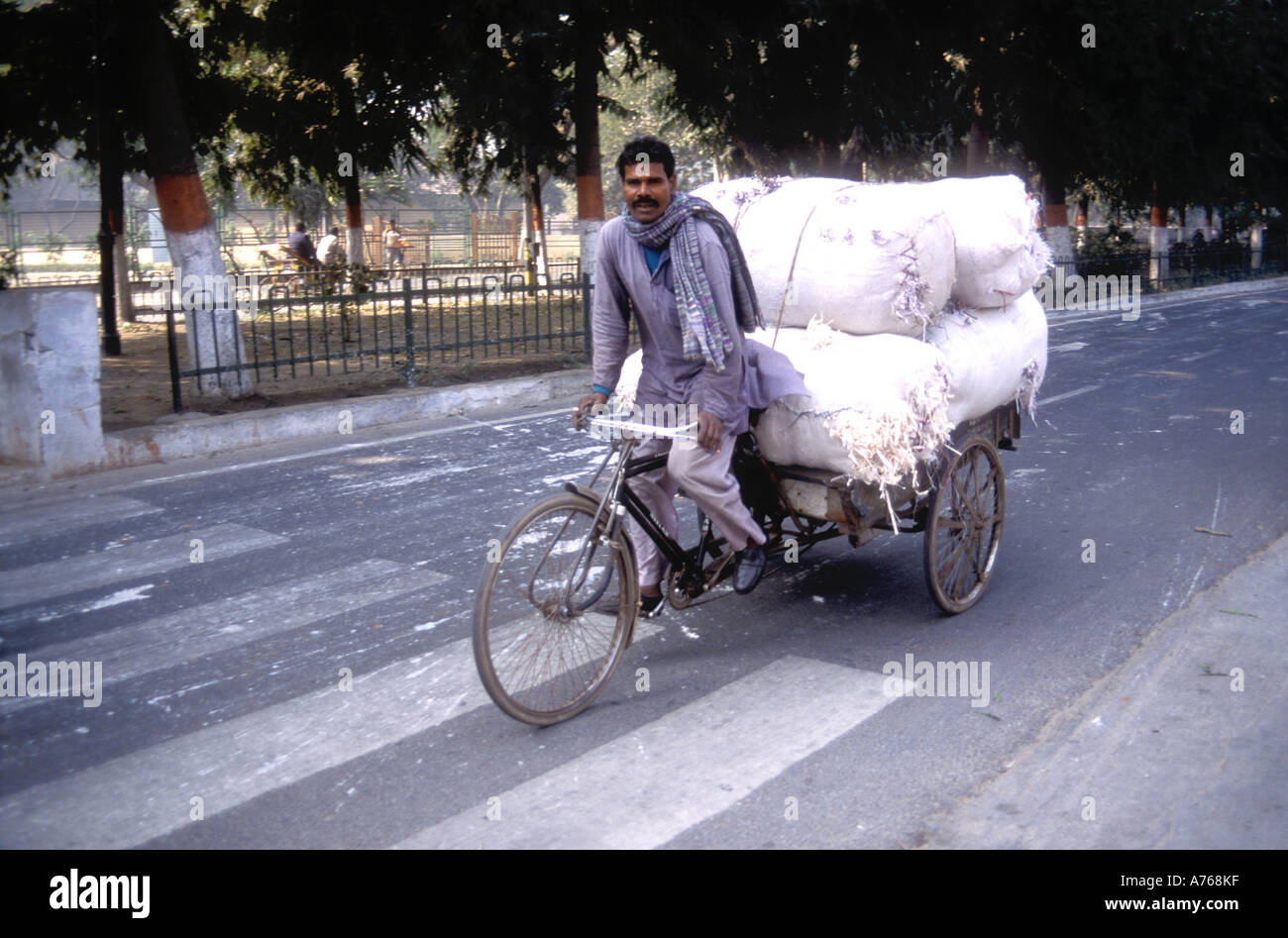 Indian man carrying sack hi-res stock photography and images - Alamy