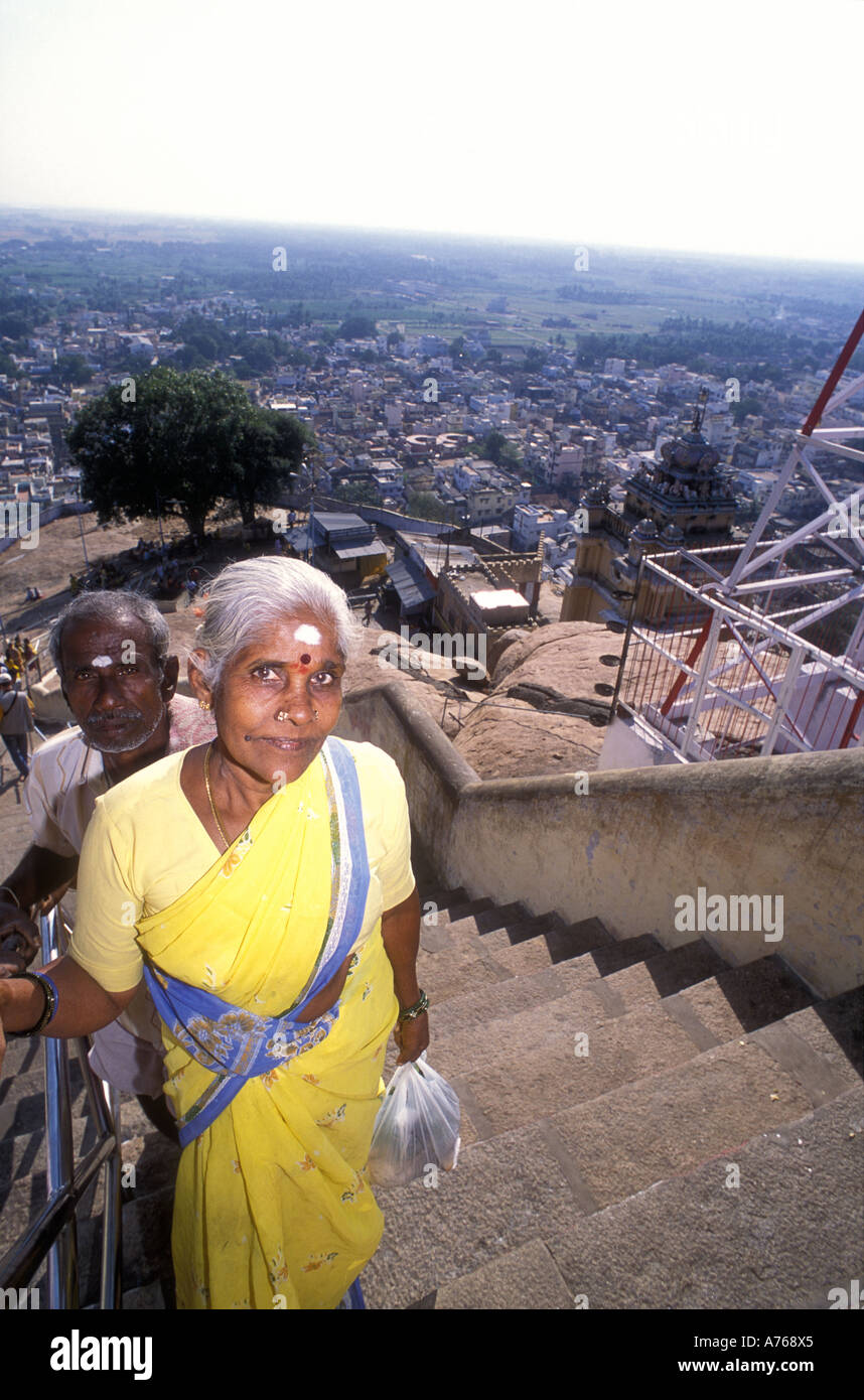 Hindu lady and gentleman on the last steps to the summit of the Rock ...