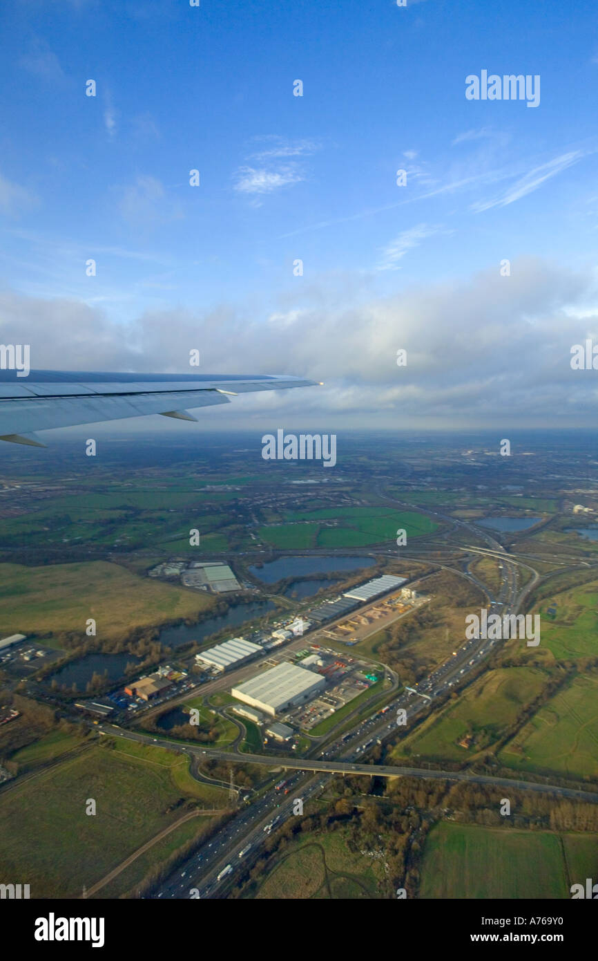 The view from a window of an aircraft over the wing as it is taking off ...