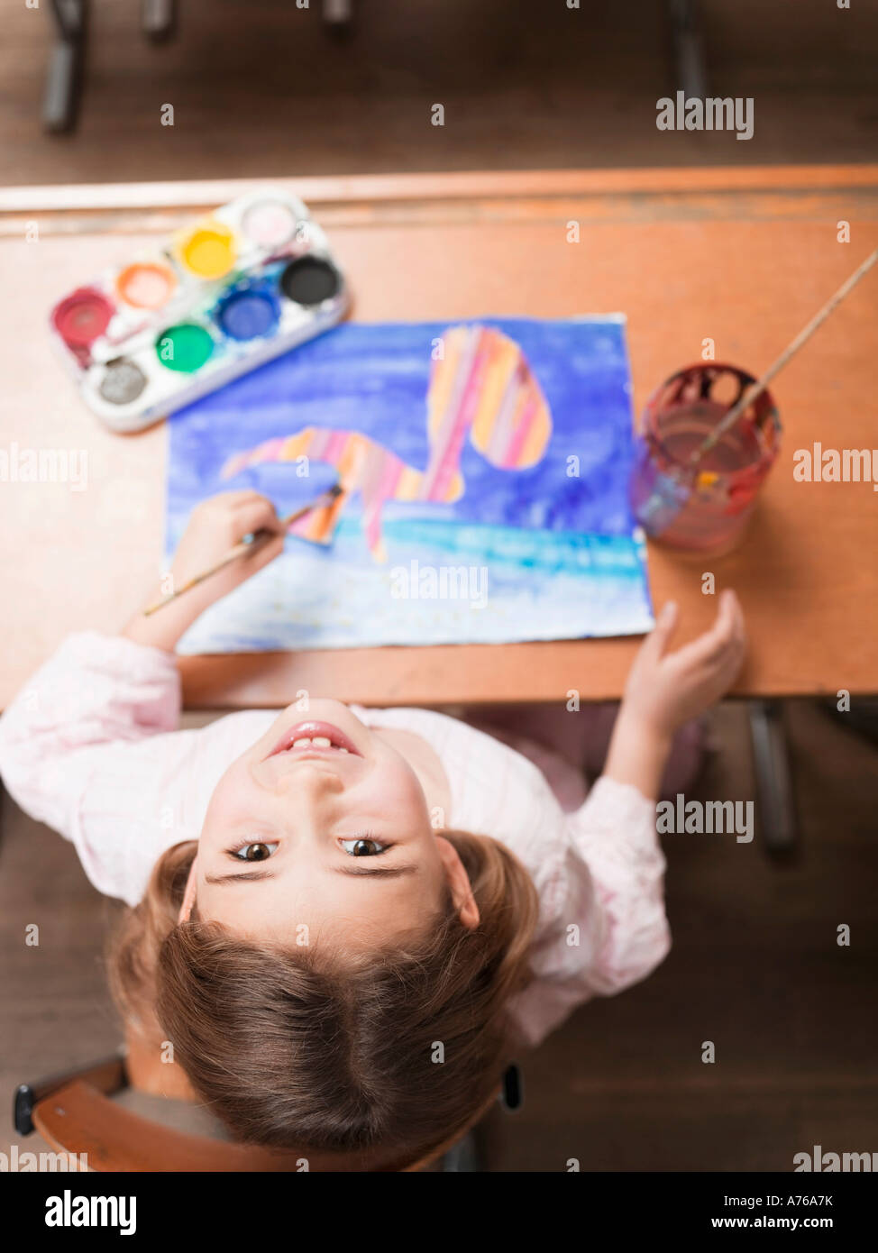 Girl painting with water colours Stock Photo - Alamy