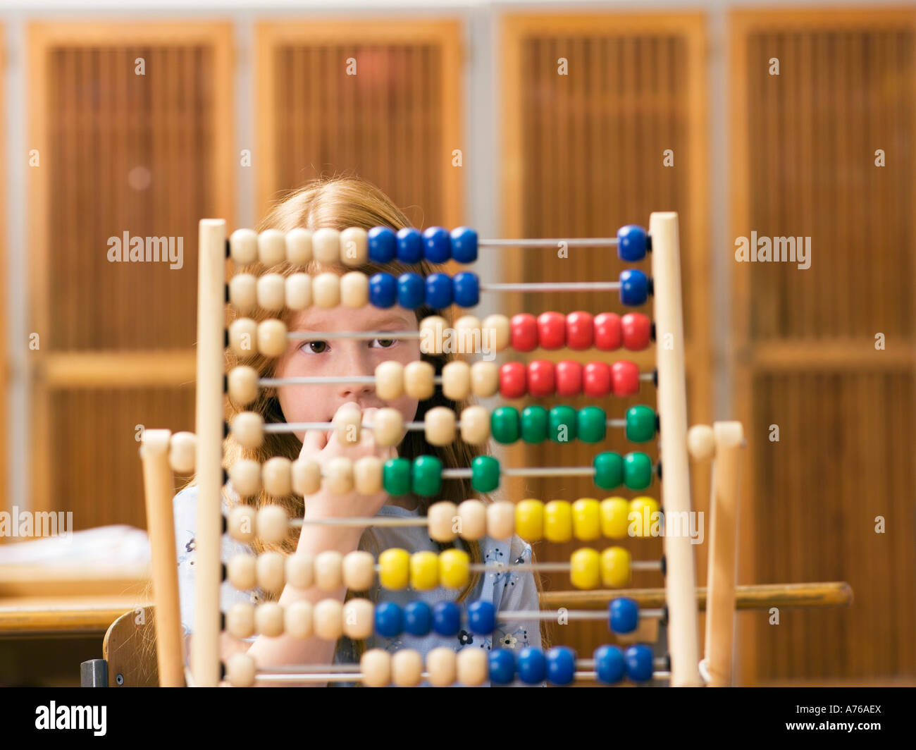 Girl using abacus Stock Photo - Alamy