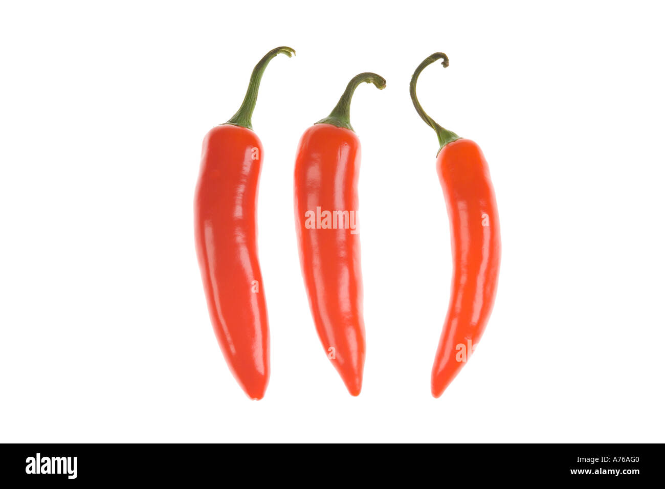 Three chillies in a row hi-res stock photography and images - Alamy