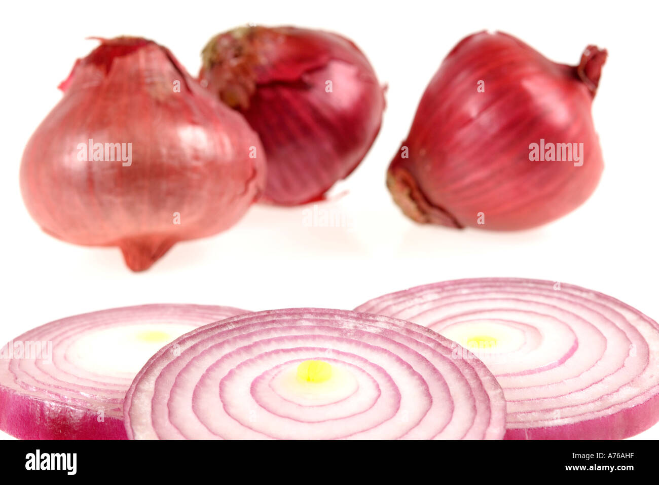 Three onions white background hi-res stock photography and images - Alamy