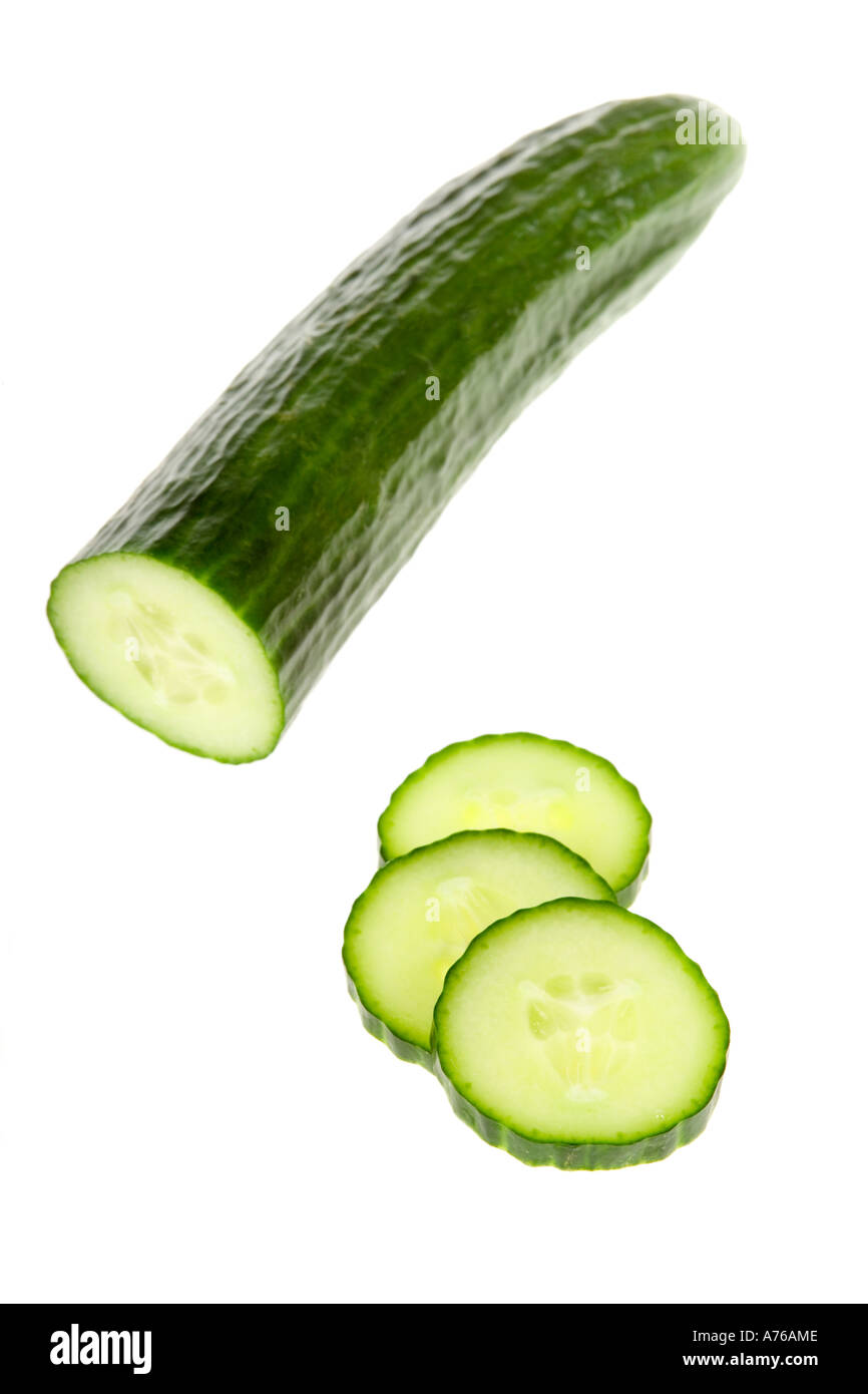 Whole cucumber with slices on a pure white background Stock Photo - Alamy