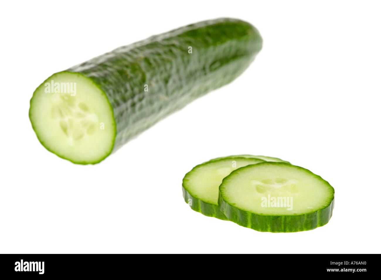 Sliced whole cucumber on Cut Out Stock Images & Pictures - Alamy