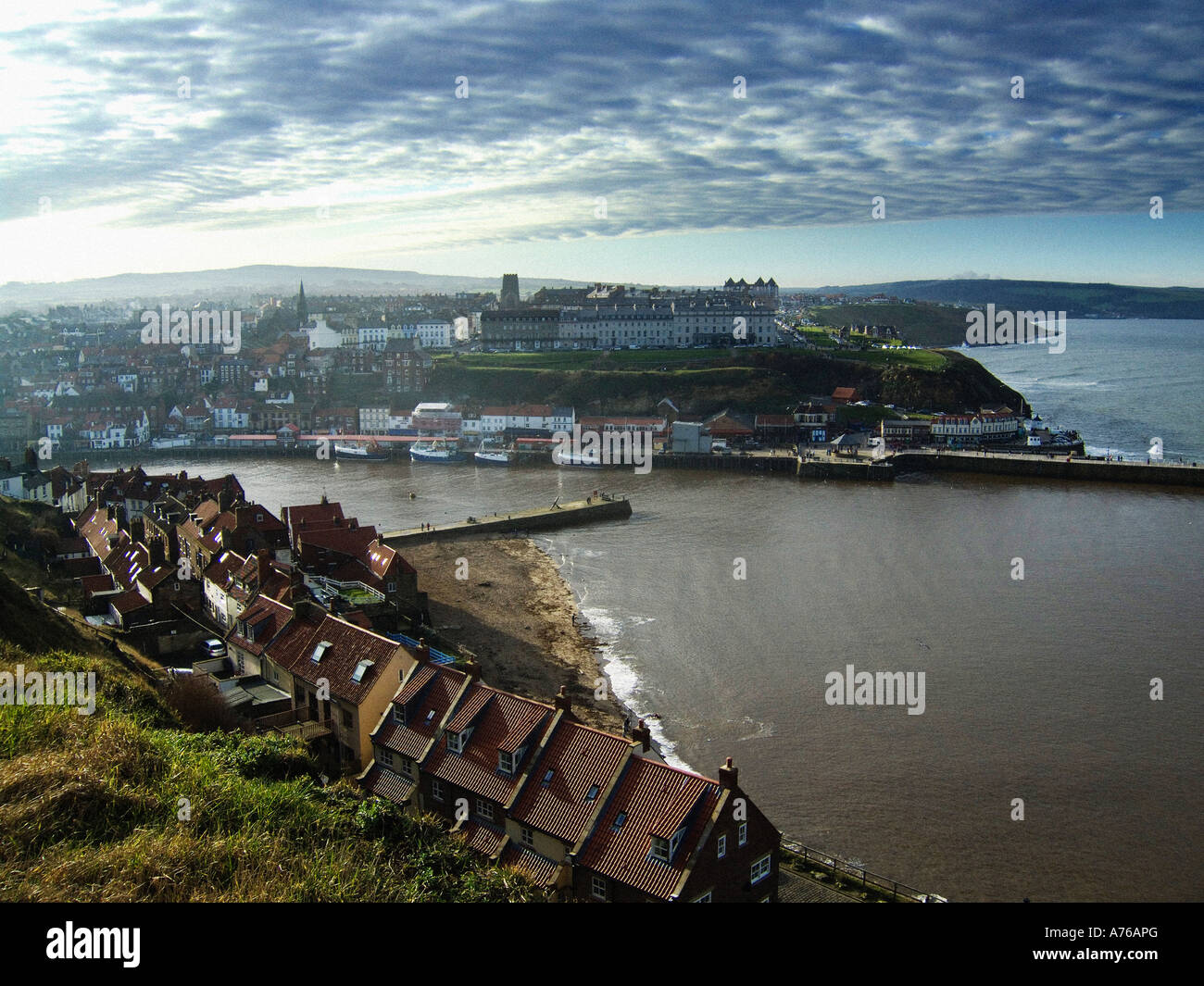 View across the harbour mouth toward the West cliff and town seen from ...