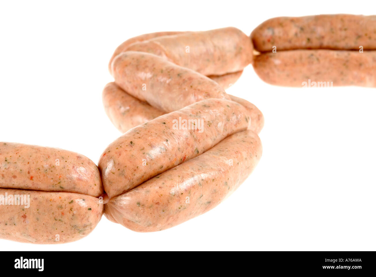 A string of raw speciality sausages on a pure white background Stock ...