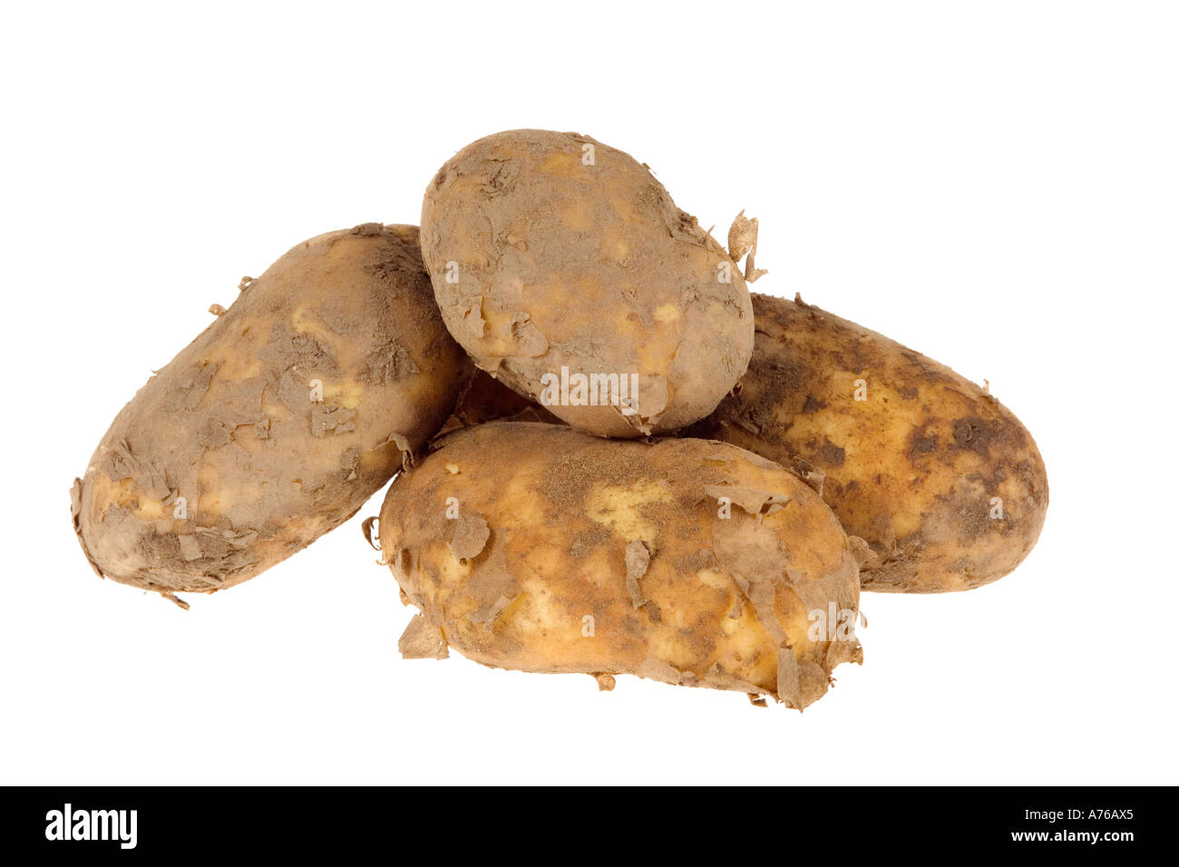 Pile of muddy new potatoes on a pure white background Stock Photo - Alamy