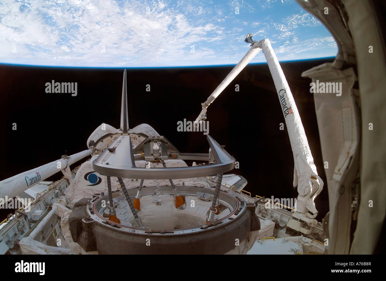 As seen through windows on the aft flight deck of Space Shuttle ...