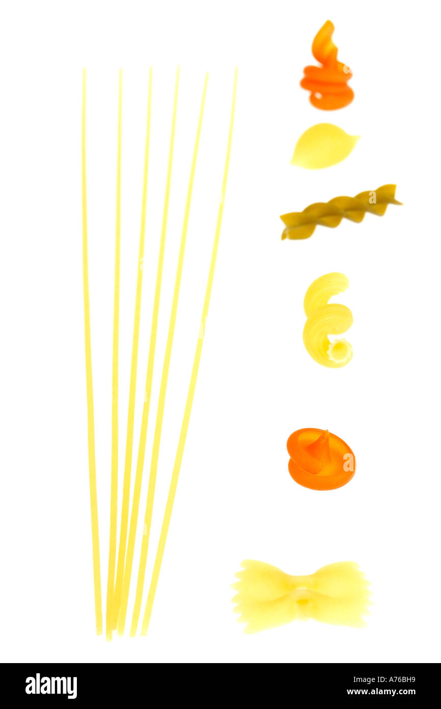 Variety of uncooked pasta on a pure white background Stock Photo - Alamy