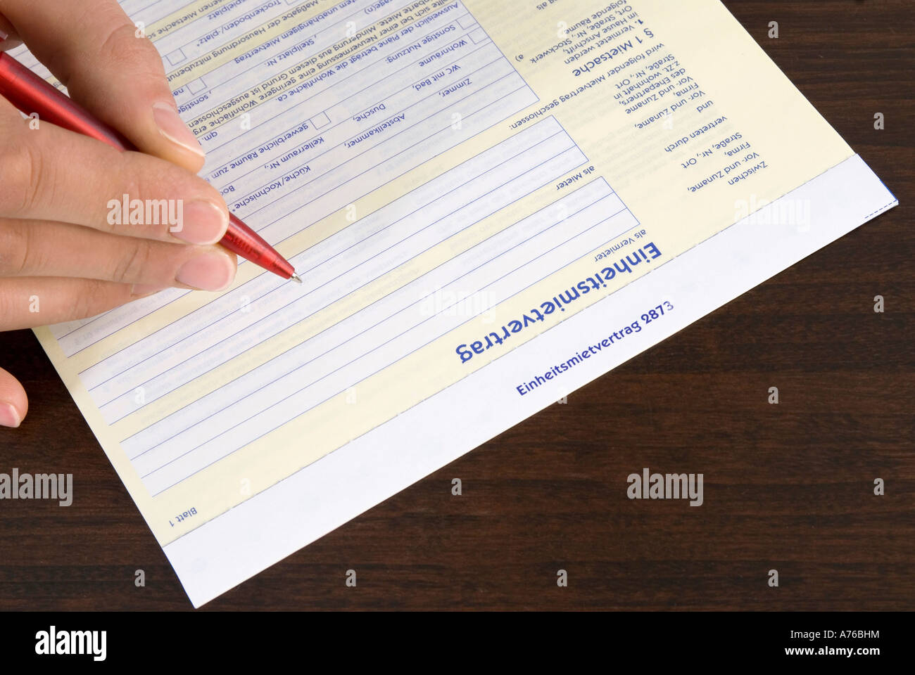 Man filling in form, close-up, elevated view Stock Photo - Alamy