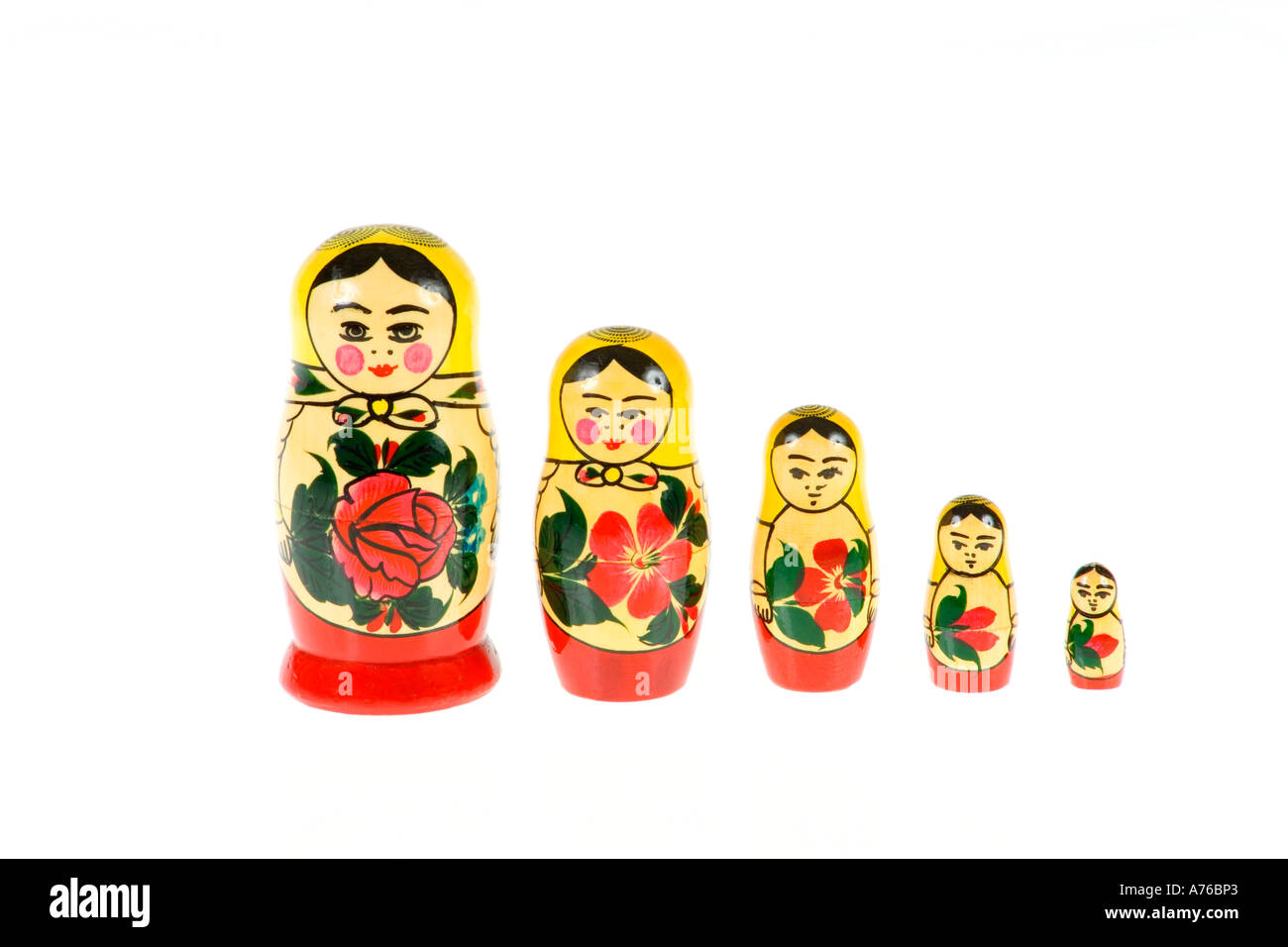 Set of 5 wooden Russian matryoshka nesting dolls on a pure white ...
