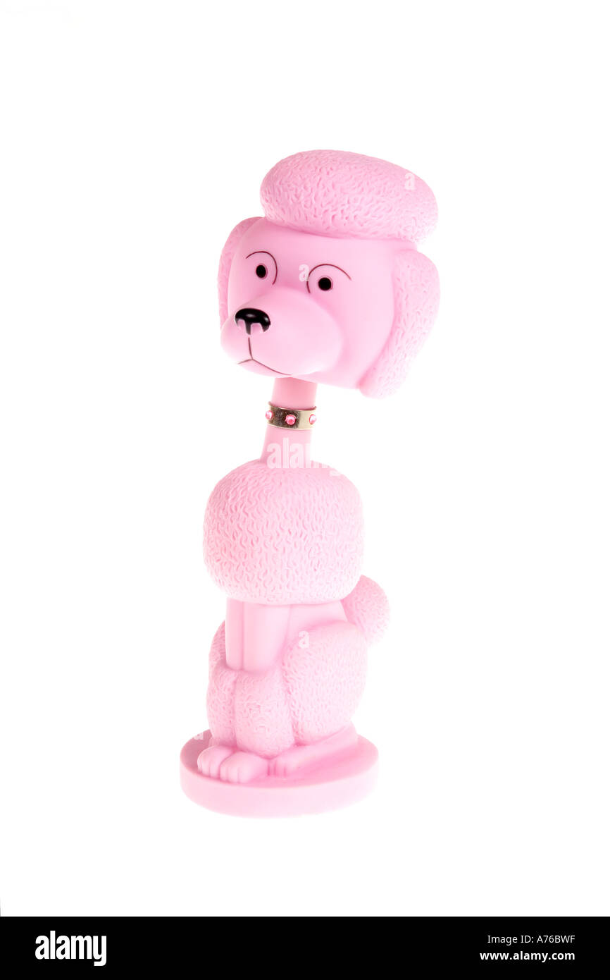 Kitsch plastic pink nodding novelty poodle dog on a pure white ...